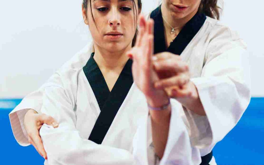trad-woman-teaching-woman-block | Empower Kickboxing™ Martial Arts ...